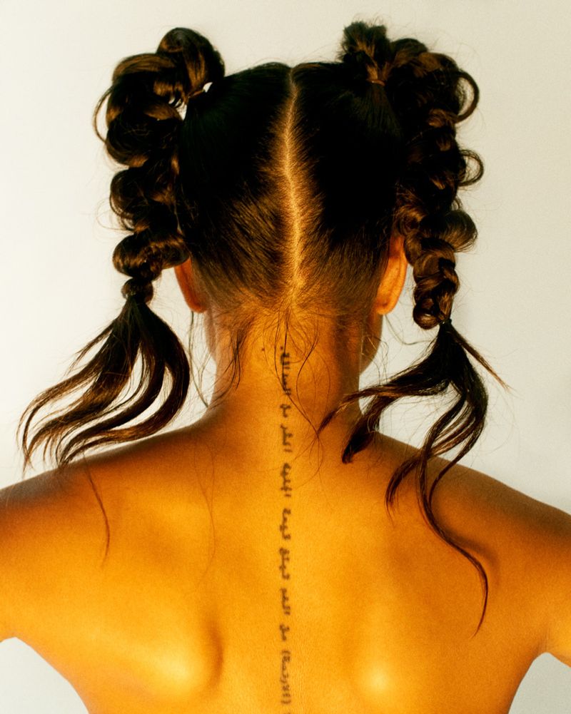 Karrueche Tran Back Tattoos